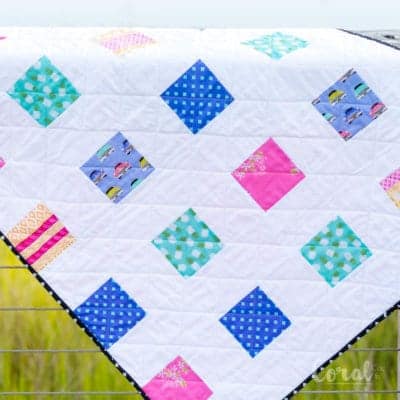 Simple Charm Pack Baby Quilt Pattern - Free Four Square Quilt Pattern